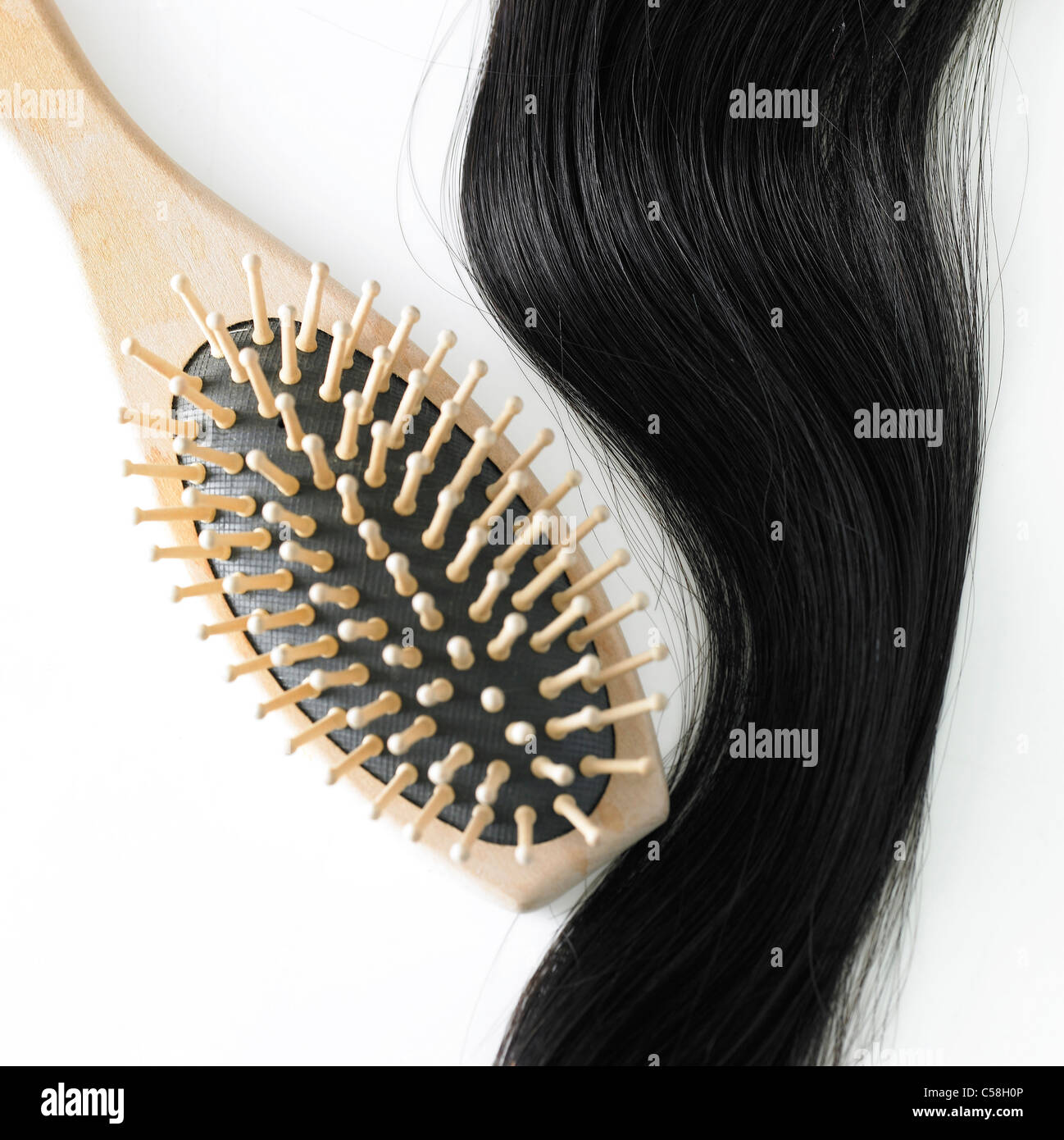 Close-up of human hair by comb Stock Photo - Alamy