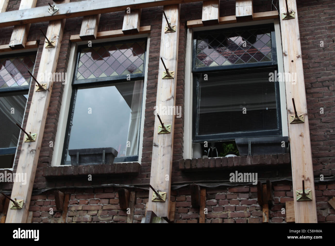 Timber support for an old Amsterdam house Stock Photo - Alamy