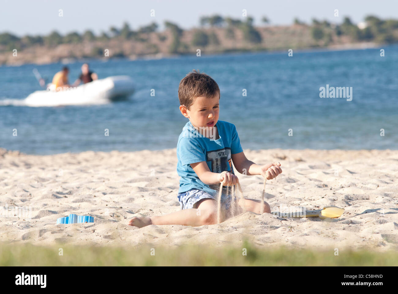boy playing on the beach Stock Photo - Alamy