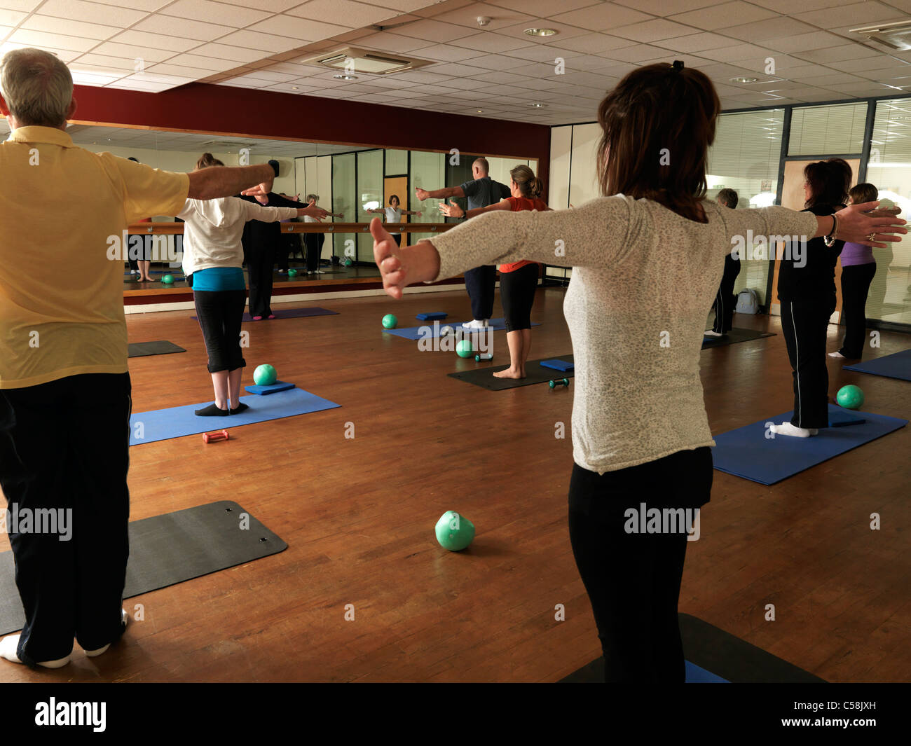 Pilates Physical Fitness Class Stock Photo - Alamy