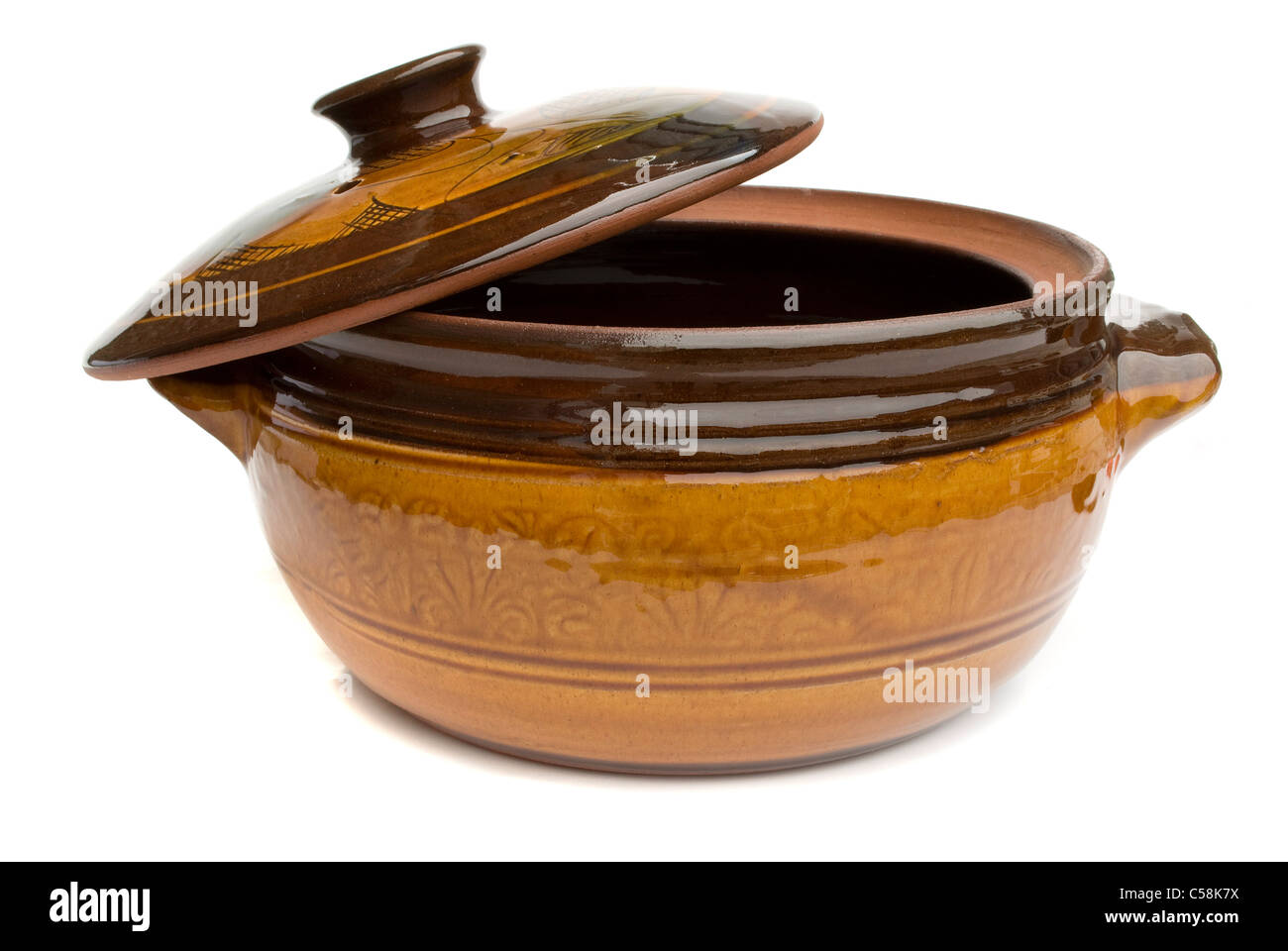 Clay pot for cooking isolated on white background Stock Photo - Alamy