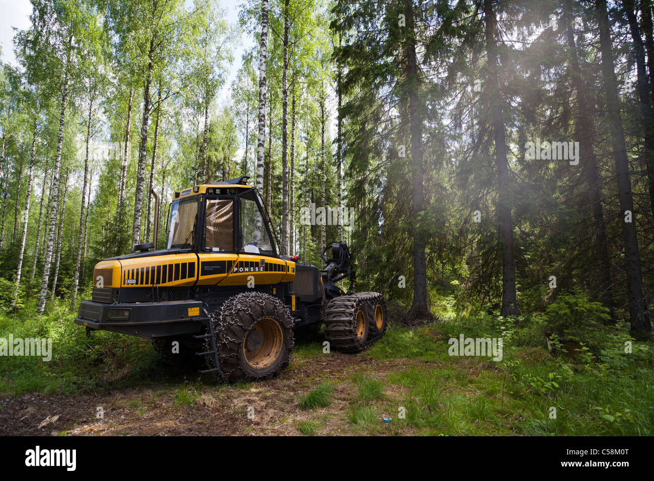 Finnish Ponsse Ergo forest harvester in the forest , Finland Stock ...