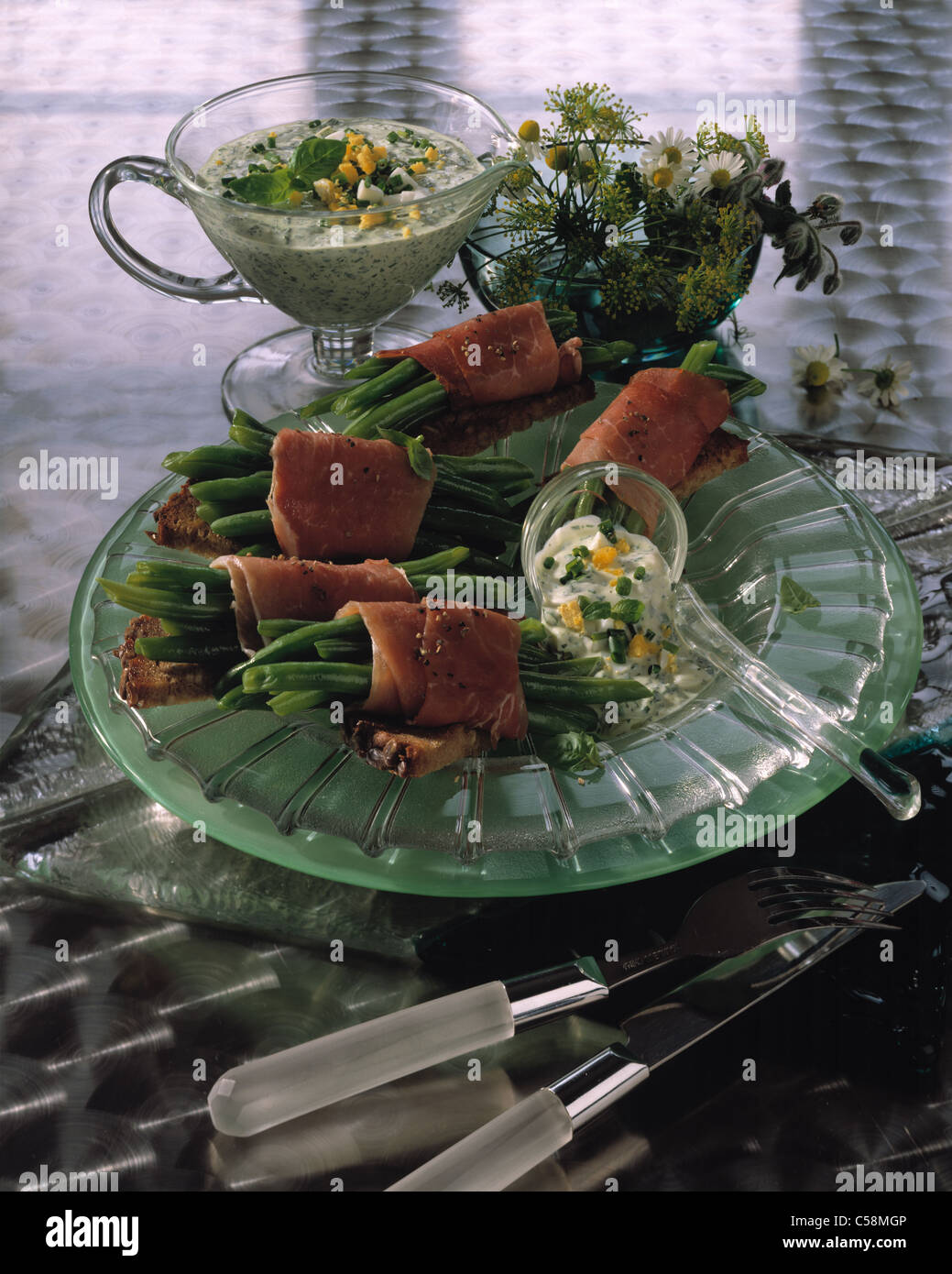 Bean - gammon rolls with green sauce Stock Photo - Alamy