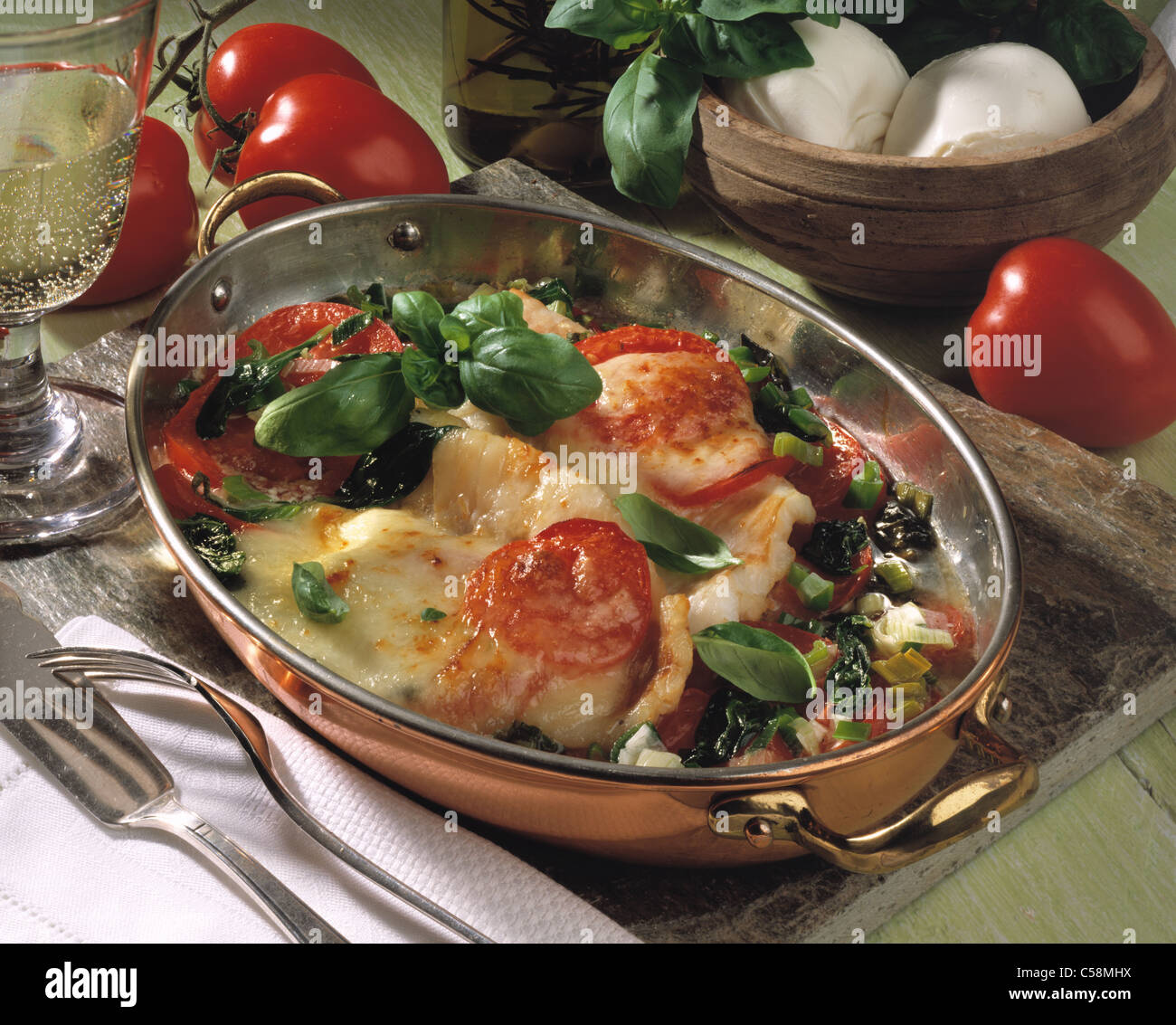 Fish fillet cooked "au gratin Stock Photo - Alamy