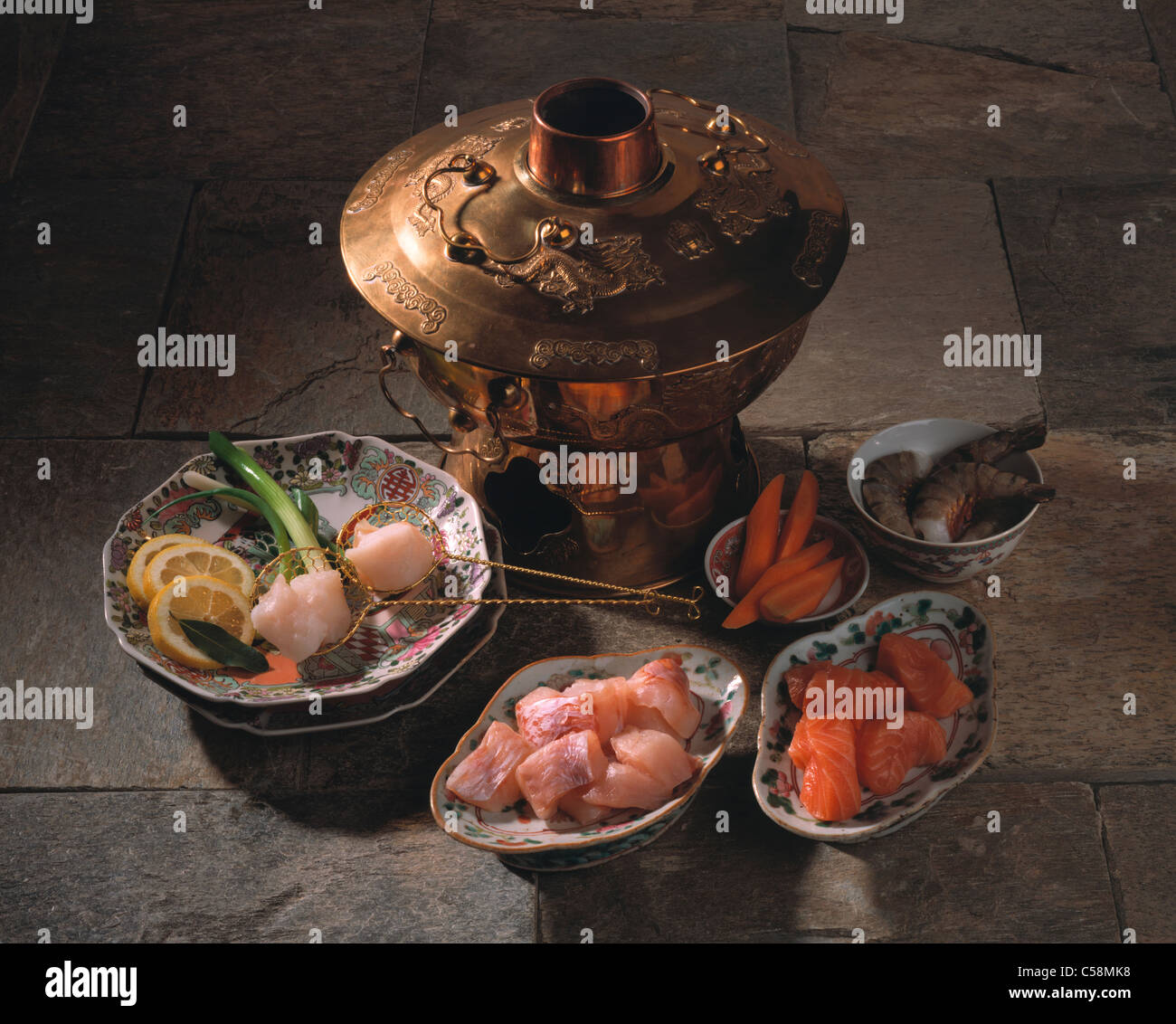 Fish - fondue Stock Photo - Alamy
