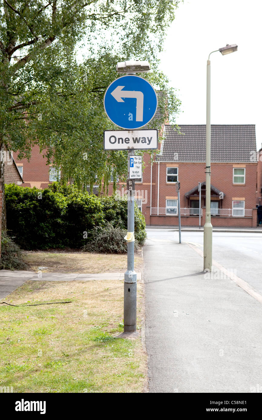 UK One Way Only Left Street Road Sign Traffic Post Stock Photo - Alamy