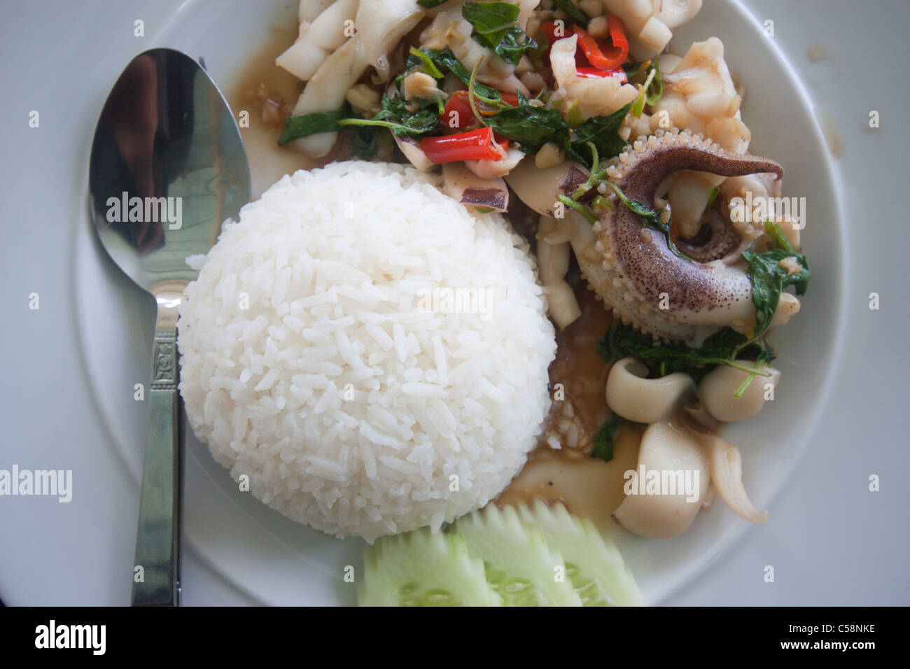 Squid fire rice Stock Photo - Alamy