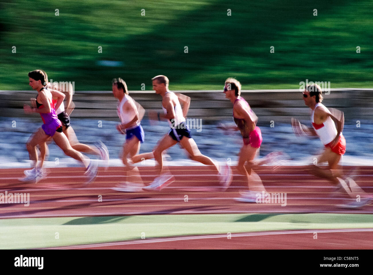 Male runners competing in a track race Stock Photo - Alamy