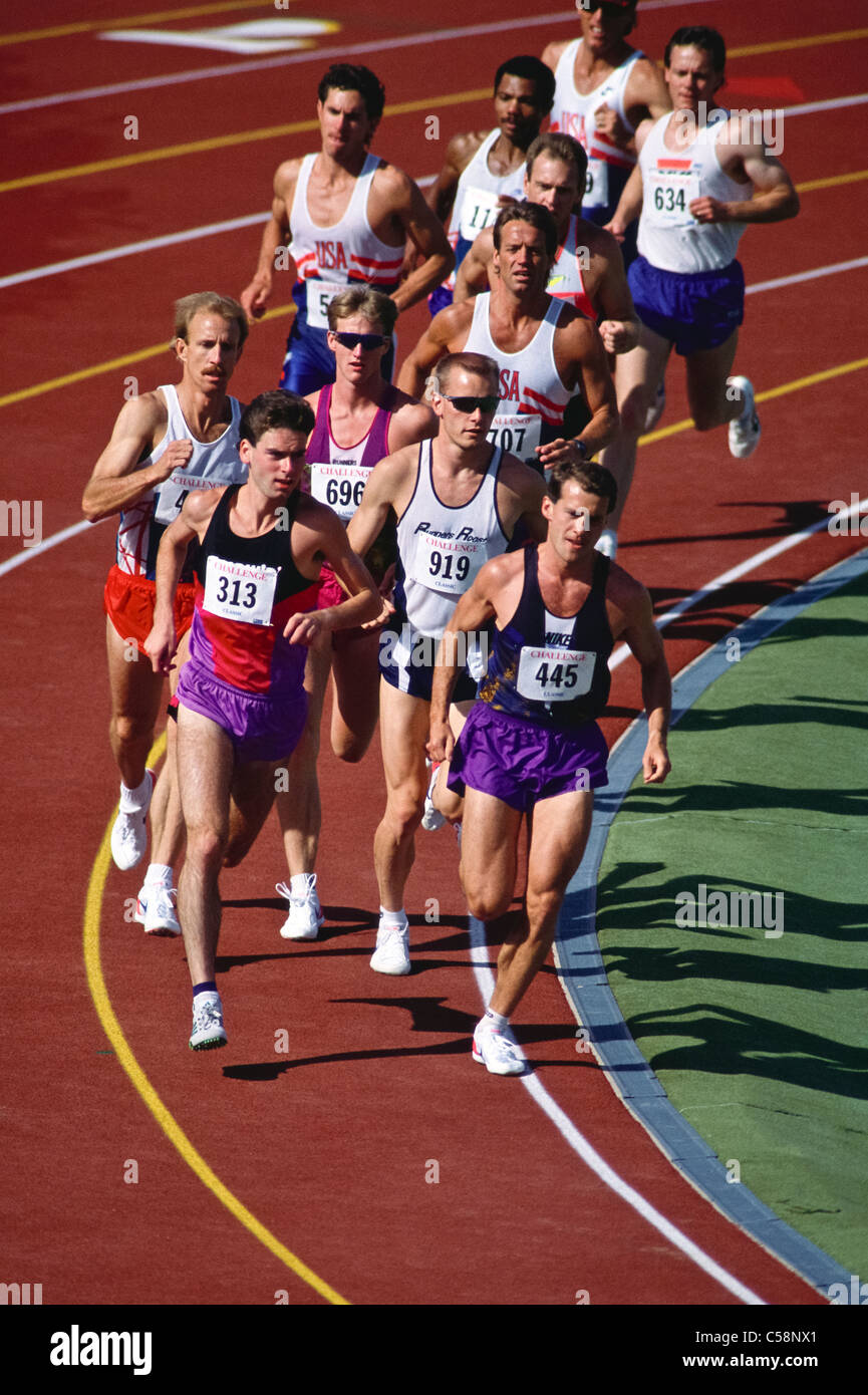 Male runners competing in a track race Stock Photo - Alamy