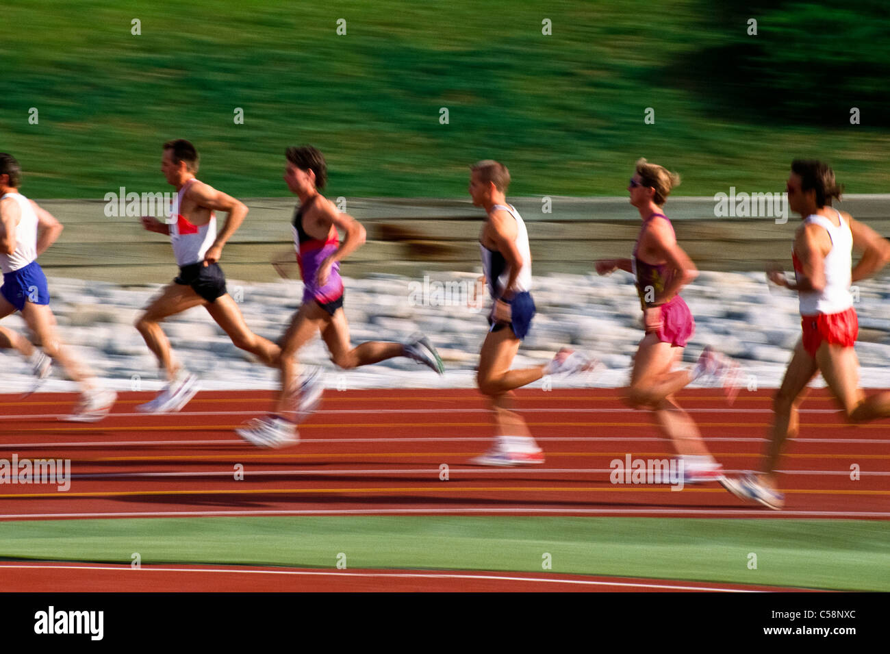 Male runners competing in a track race Stock Photo - Alamy