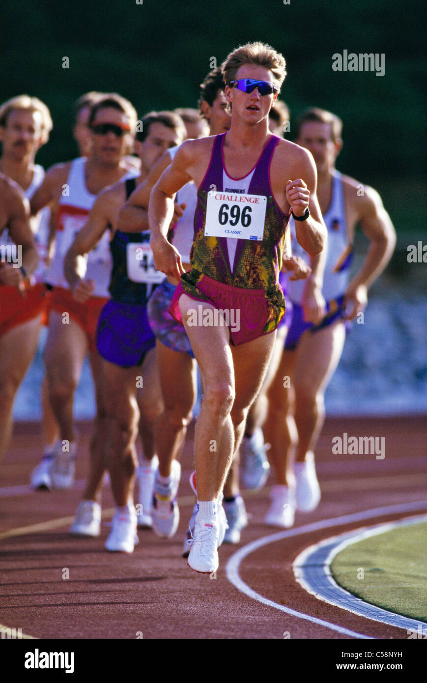 Male runners competing in a track race Stock Photo - Alamy