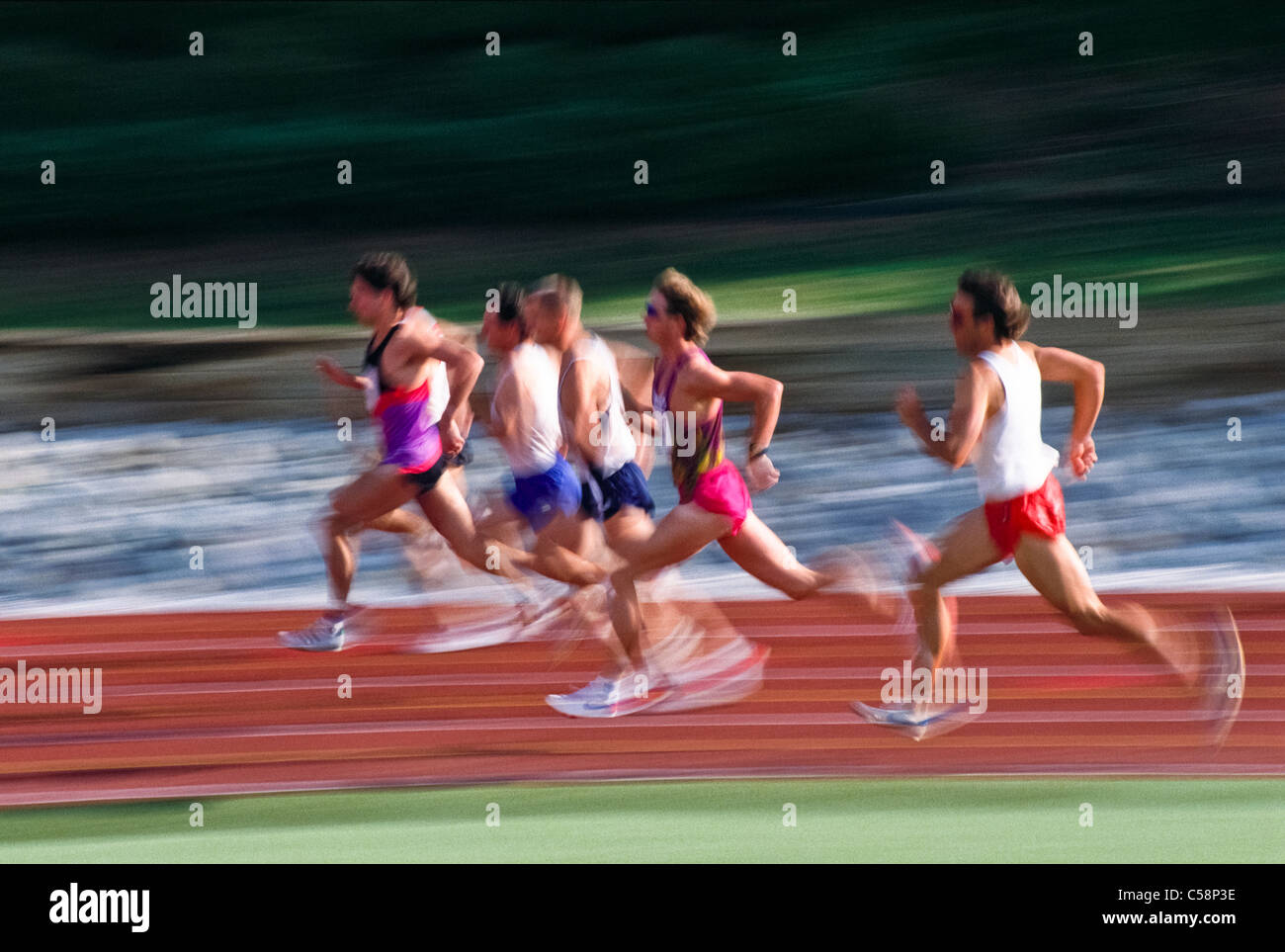 Male runners competing in a track race Stock Photo - Alamy