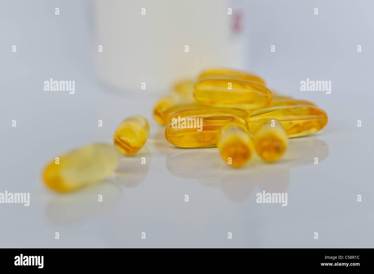Fish oil in capsules Stock Photo - Alamy