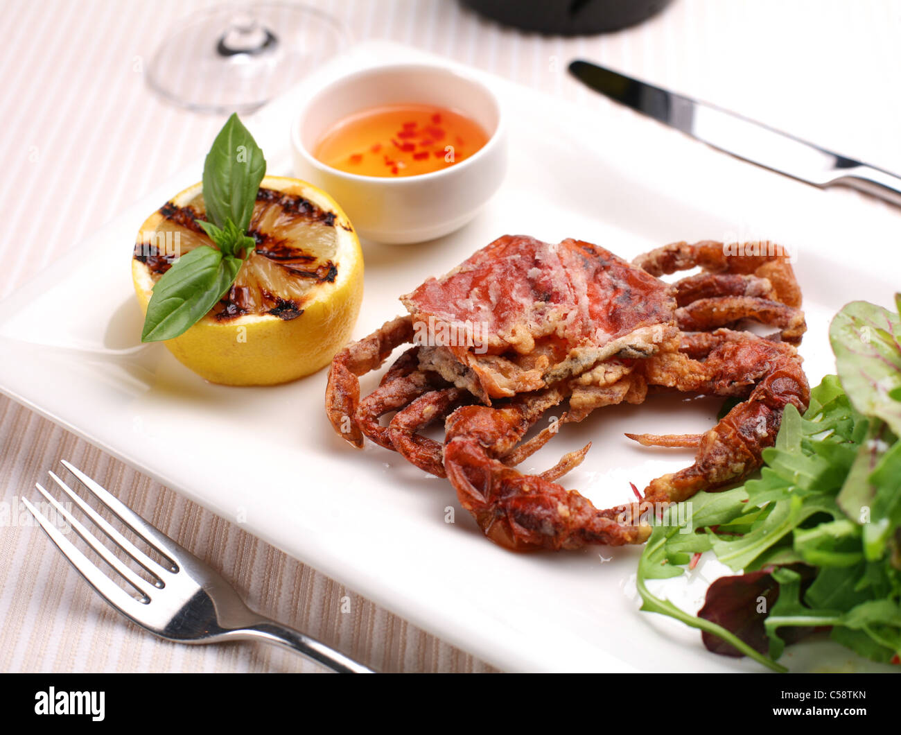 Cooked crab on a white background Stock Photo - Alamy