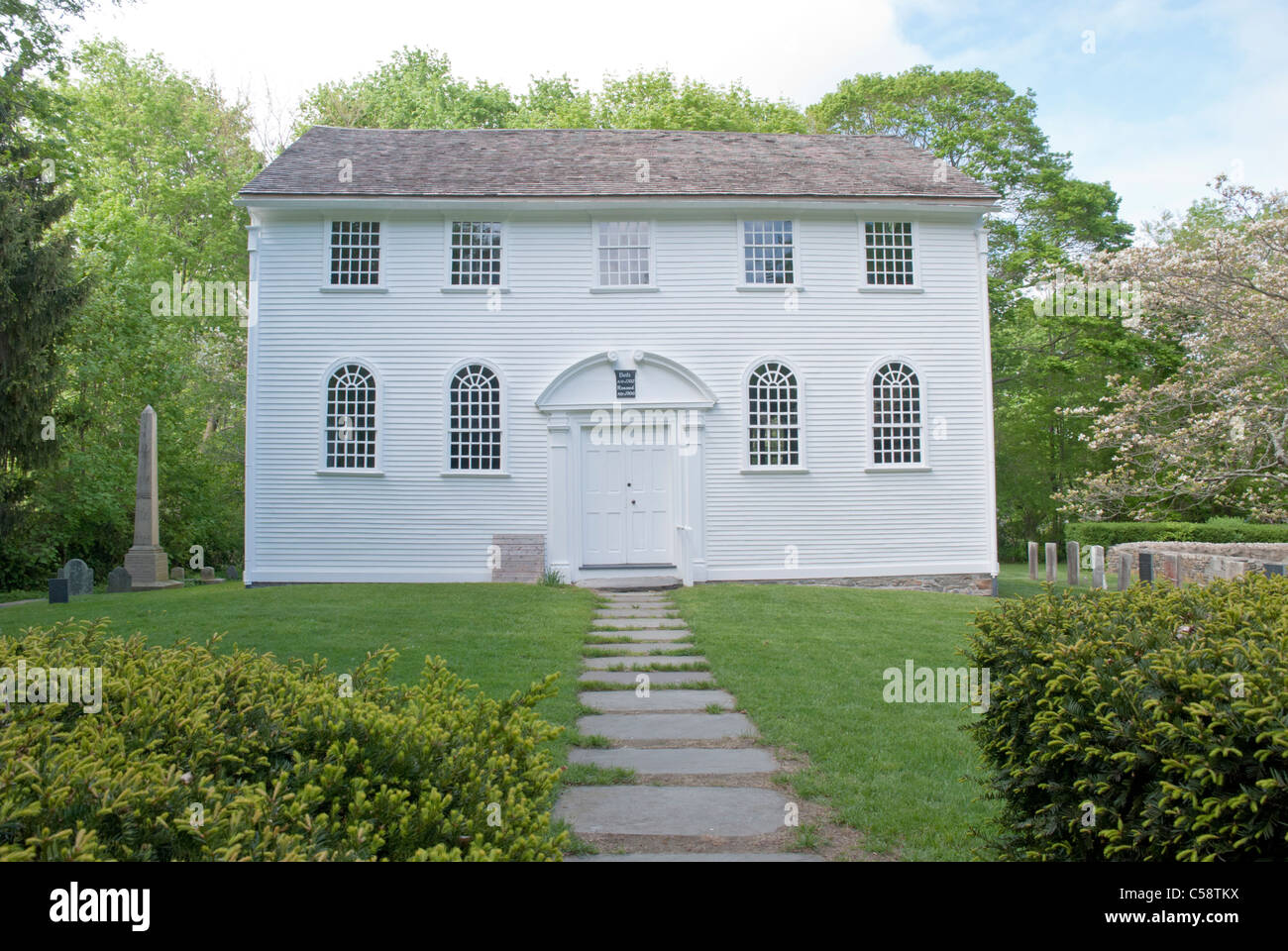 An old church in Wickford, Rhode Island is surrounded by graveyards ...