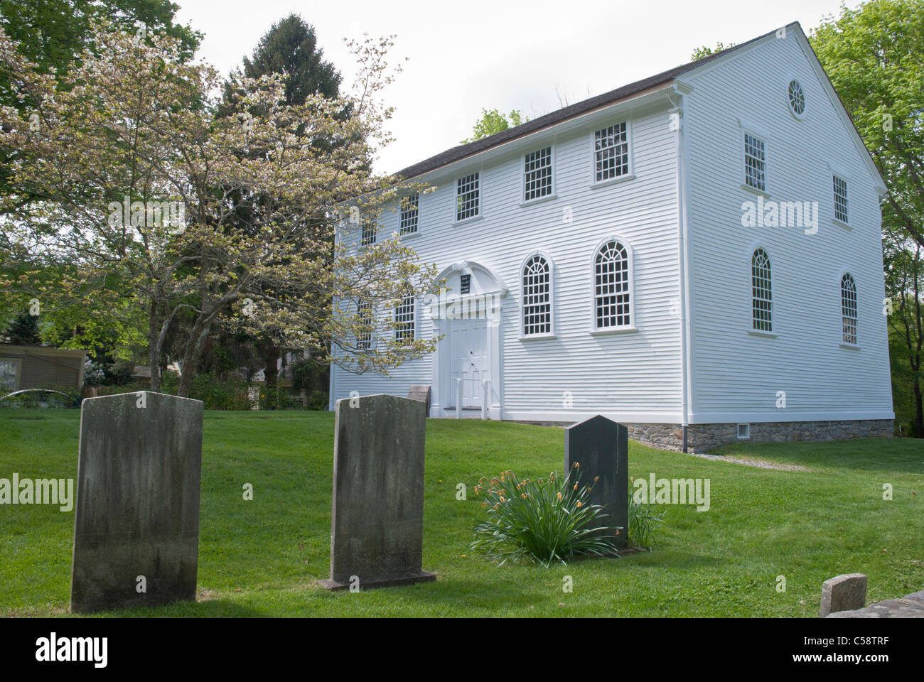 An old church in Wickford, Rhode Island is surrounded by graveyards ...