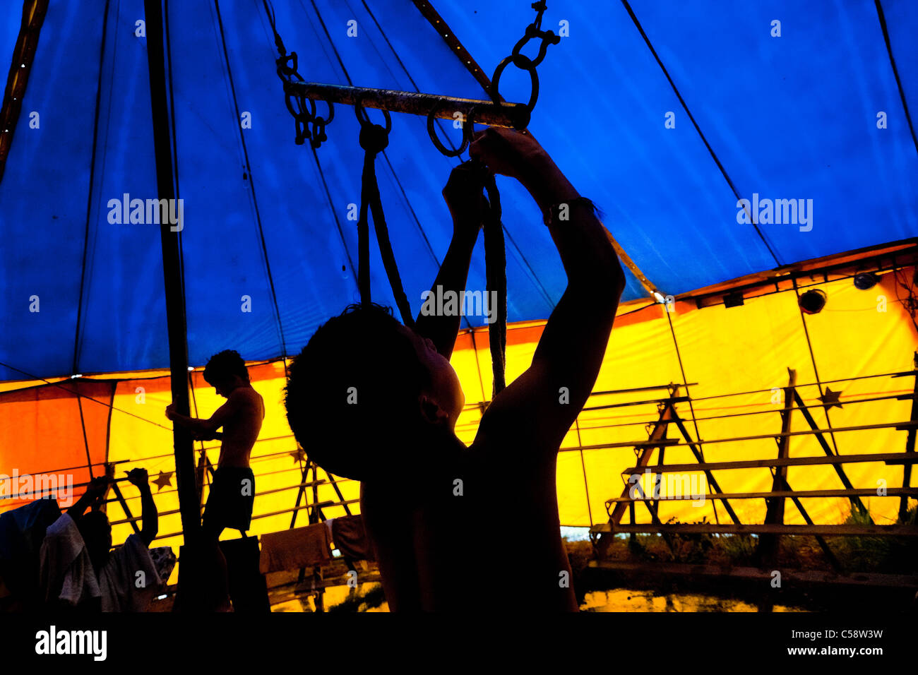 Raimundo, 9, prepares a flying trapeze at the Circo Anny, a family run ...