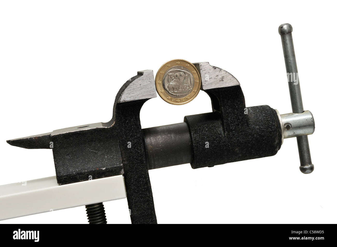 Greek Euro Coin in a Vice Stock Photo - Alamy