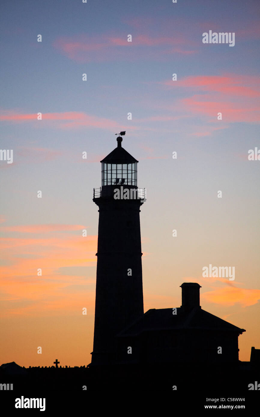 Old light lighthouse with deckchairs in the lookout at the top and ...