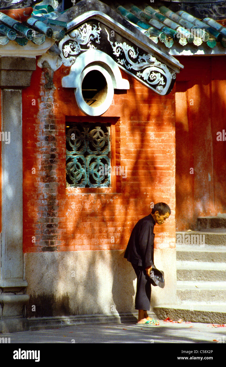 Macau Temple Of The Lotus Man Outside Stock Photo - Alamy
