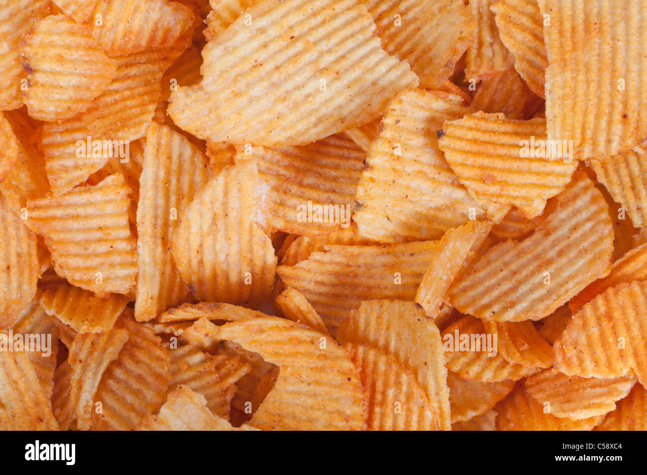 Potato chips colorful abstract background Stock Photo - Alamy