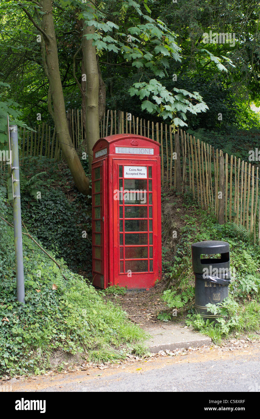 old style English telephone box iat Chiddingstone, Kent with a notice ...