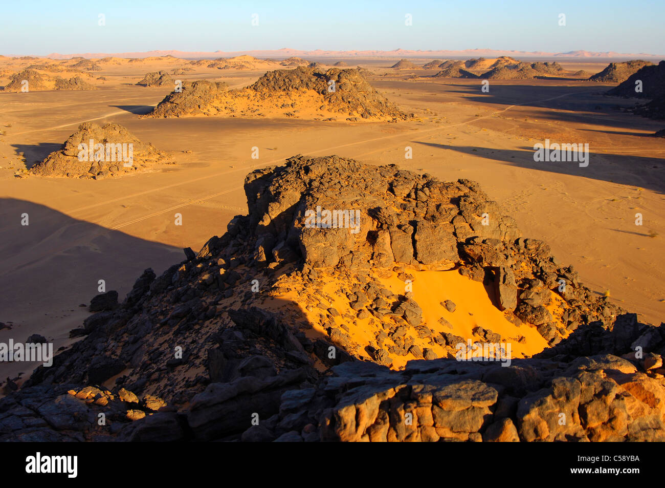 Desertscape with eroded rock hills in the Acacus Mountains, Sahara ...