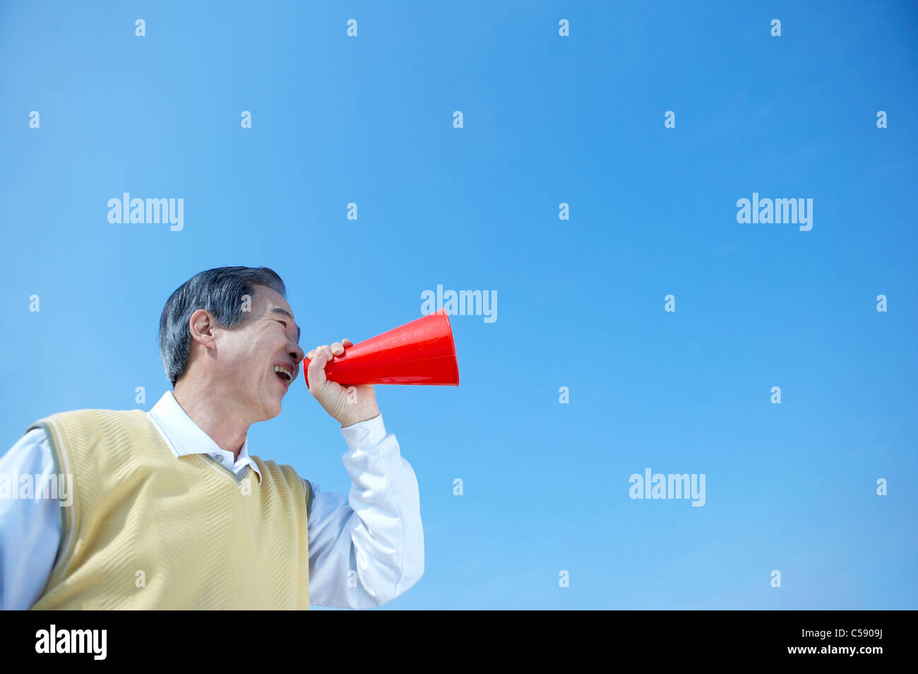 Man holding megaphone hi-res stock photography and images - Alamy