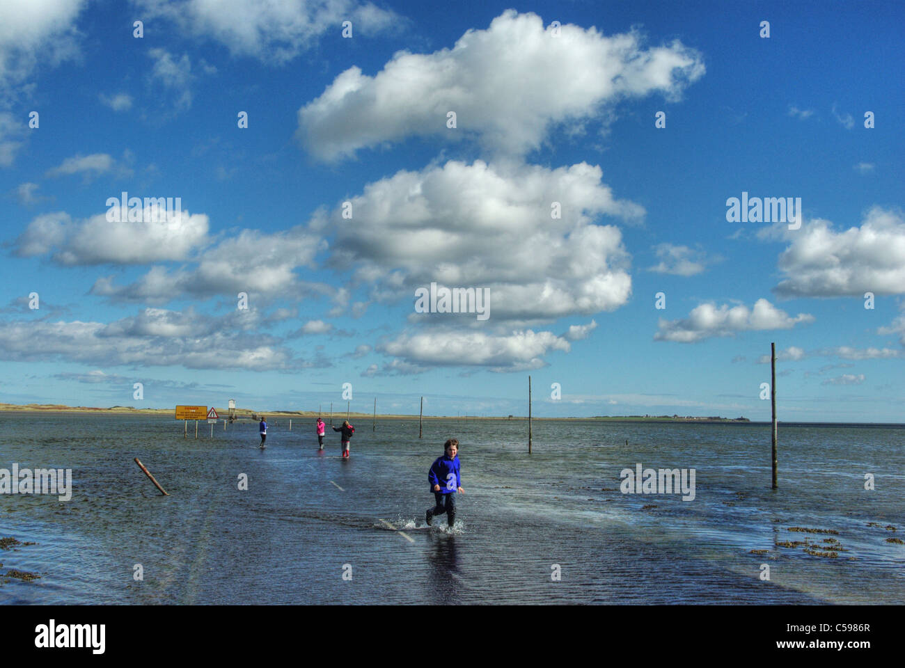 Playing and splashing around hi-res stock photography and images - Alamy