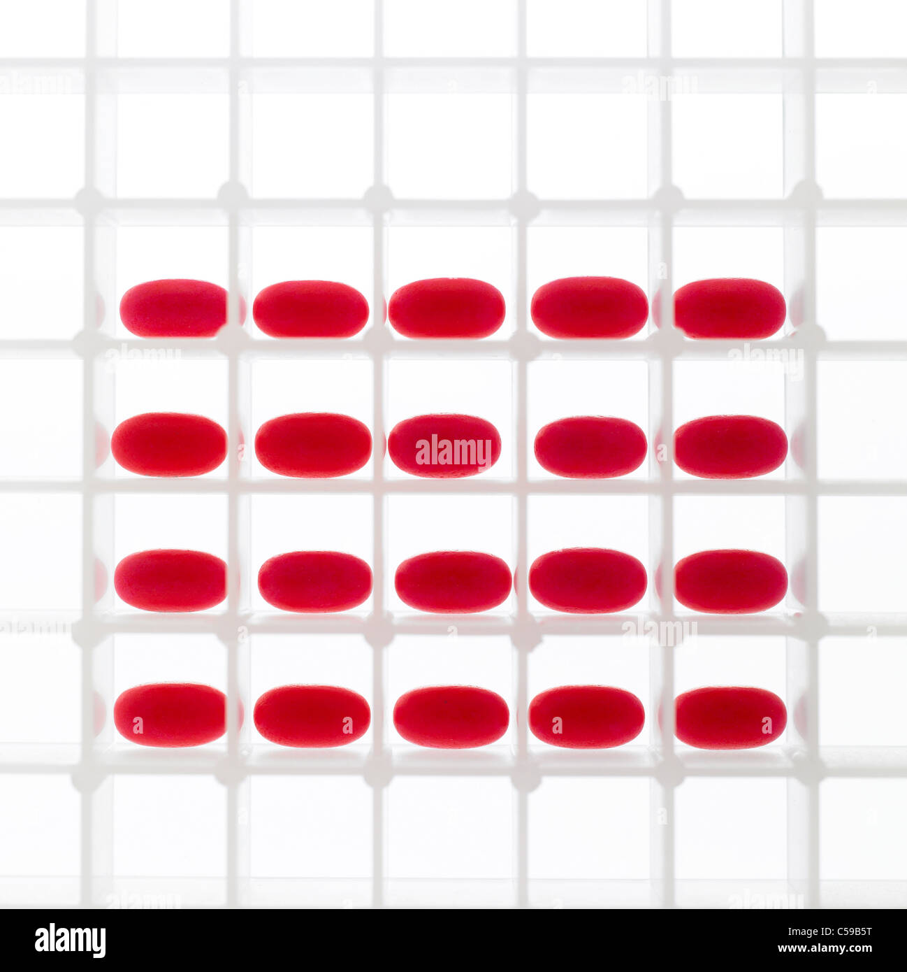 Red capsules hi-res stock photography and images - Alamy