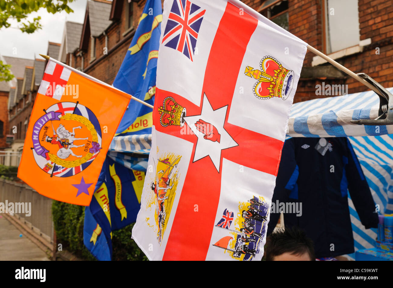 Ulster flag and Orange Order flag at a stall at a street party on 11th ...