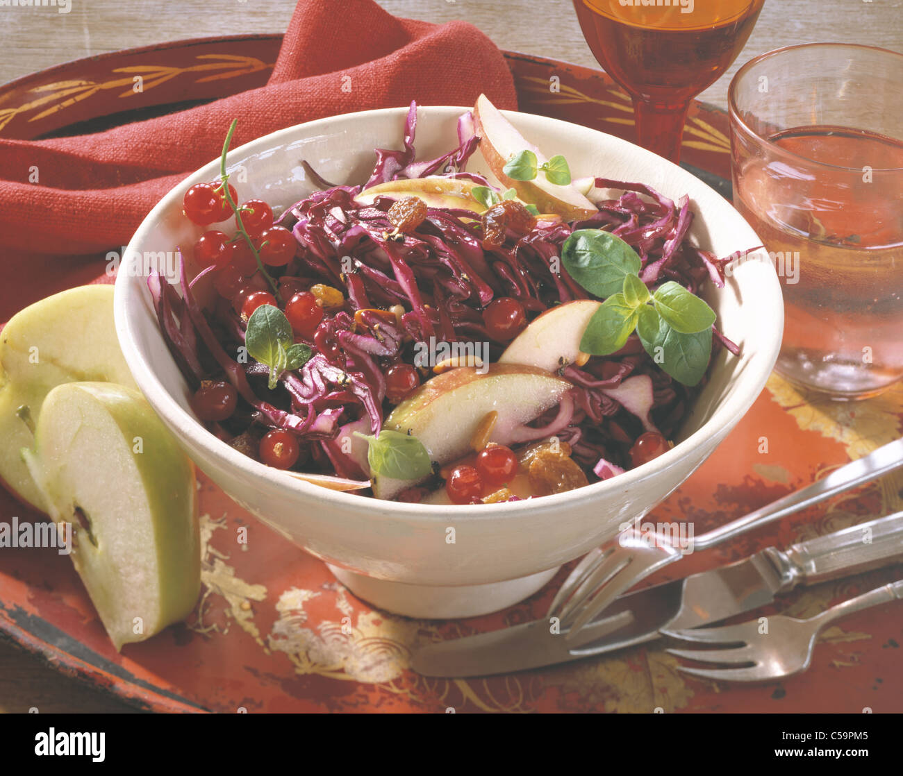 Red cabbage salad with currant - dressing Stock Photo - Alamy