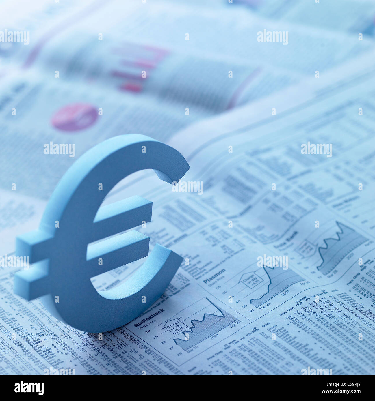 Close-up of Euro symbol on financial newspaper Stock Photo - Alamy
