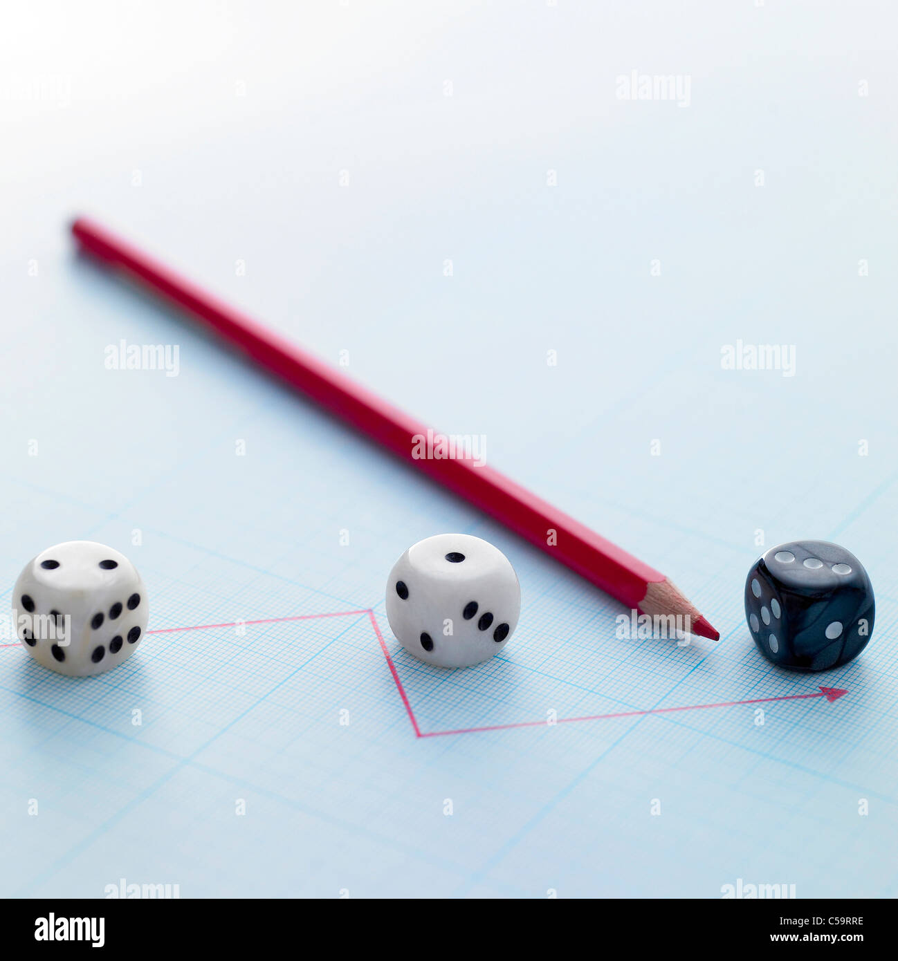 Close-up of Dice, Drawn Arrow and Colored Pencil Stock Photo - Alamy