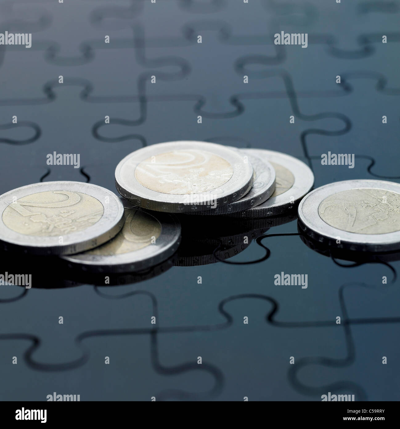 Jigsaw puzzle money euro hi-res stock photography and images - Alamy