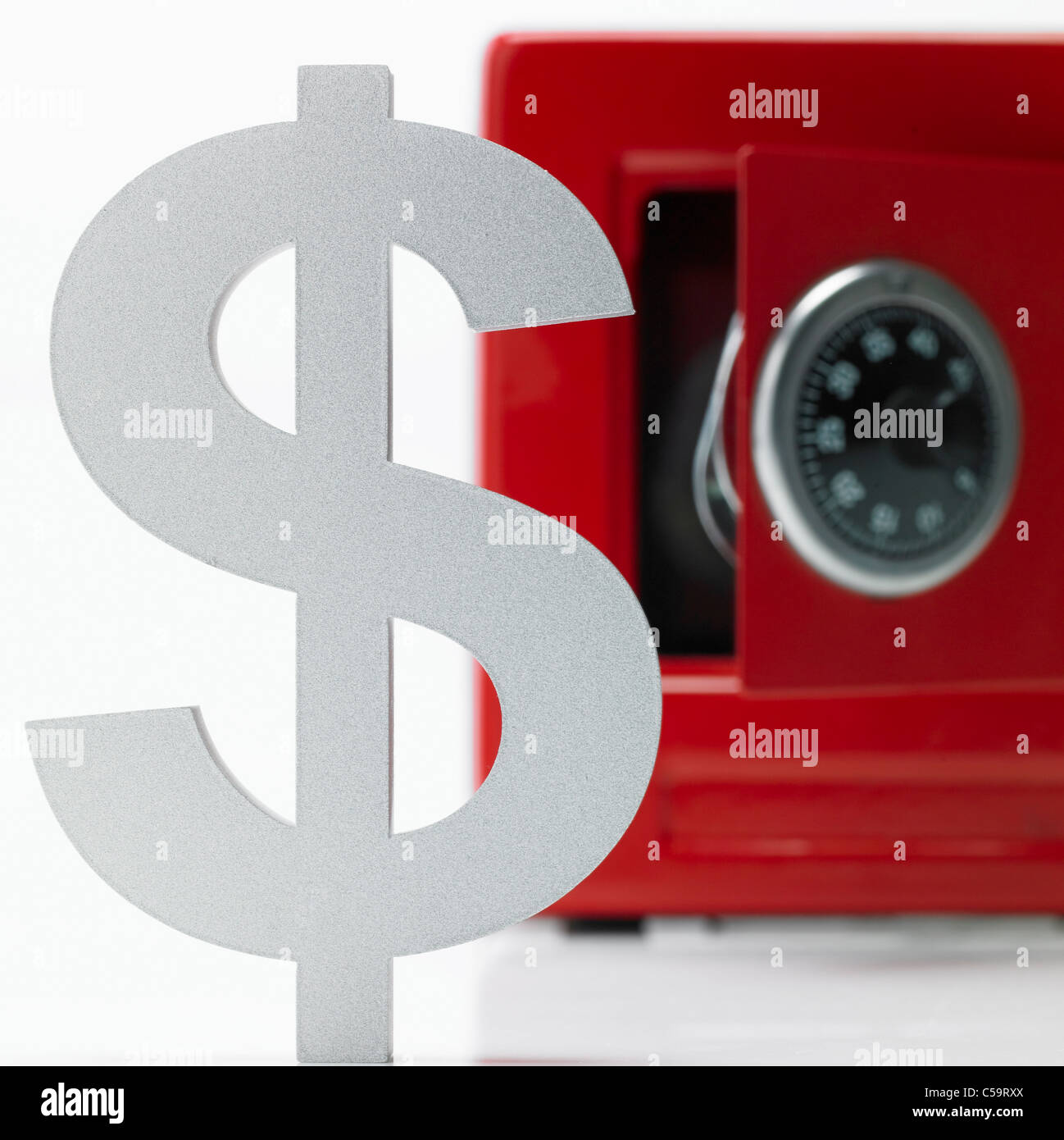 Close-up of Dollar sign, combination safe in the background Stock Photo ...
