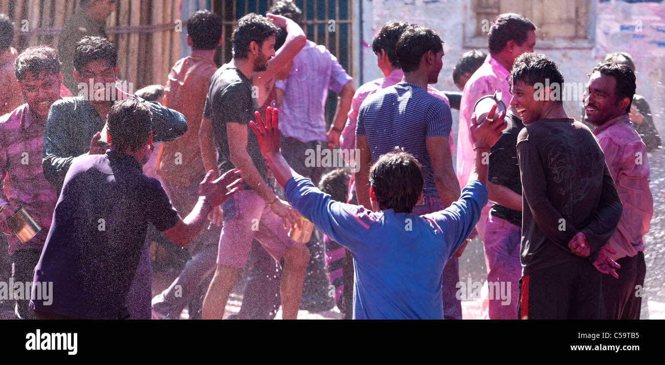 Holi festival india throwing powder hi-res stock photography and images ...