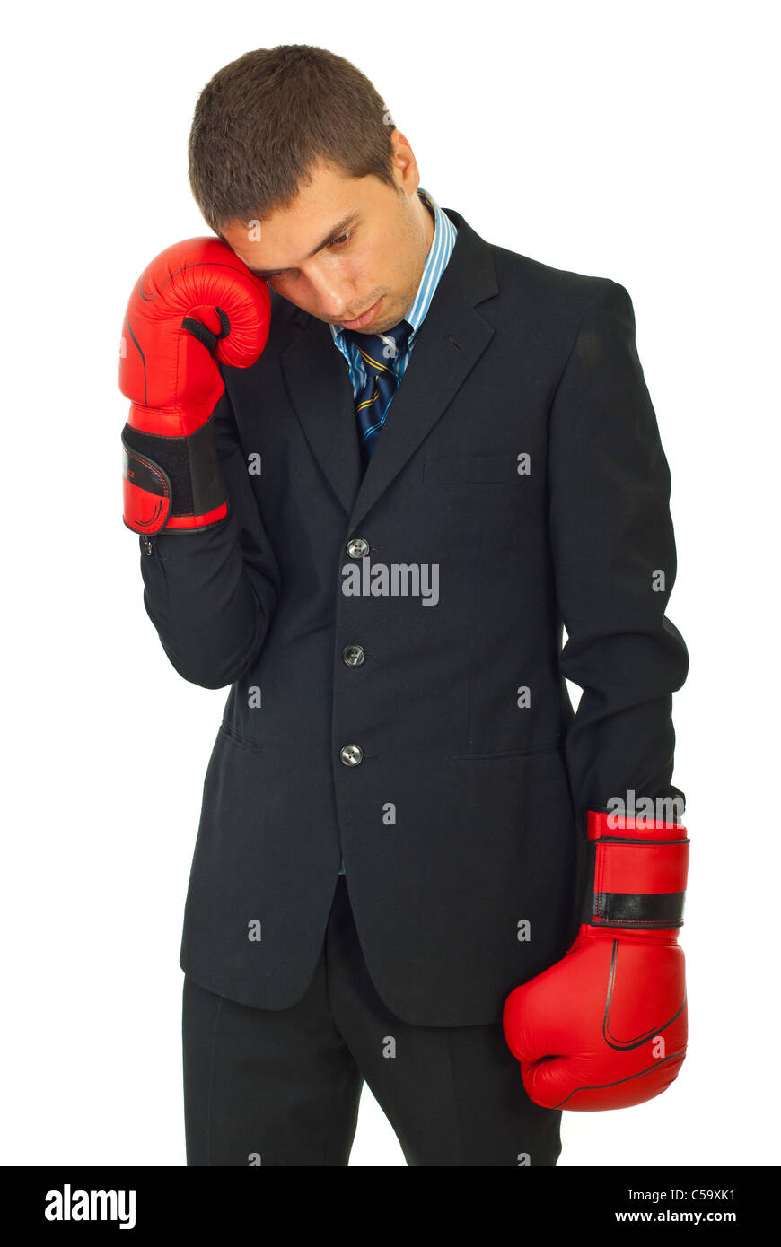Loser sad business man wearing boxing gloves isolated on white ...