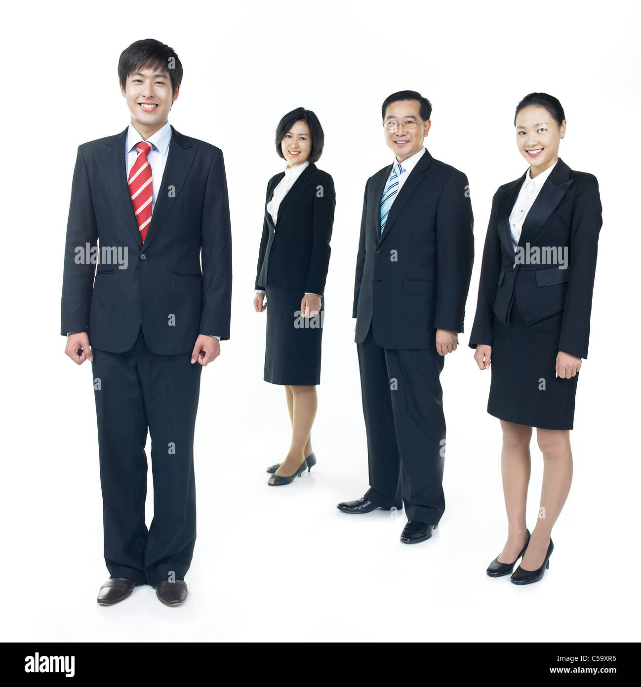Portrait of businesspeople standing Stock Photo - Alamy