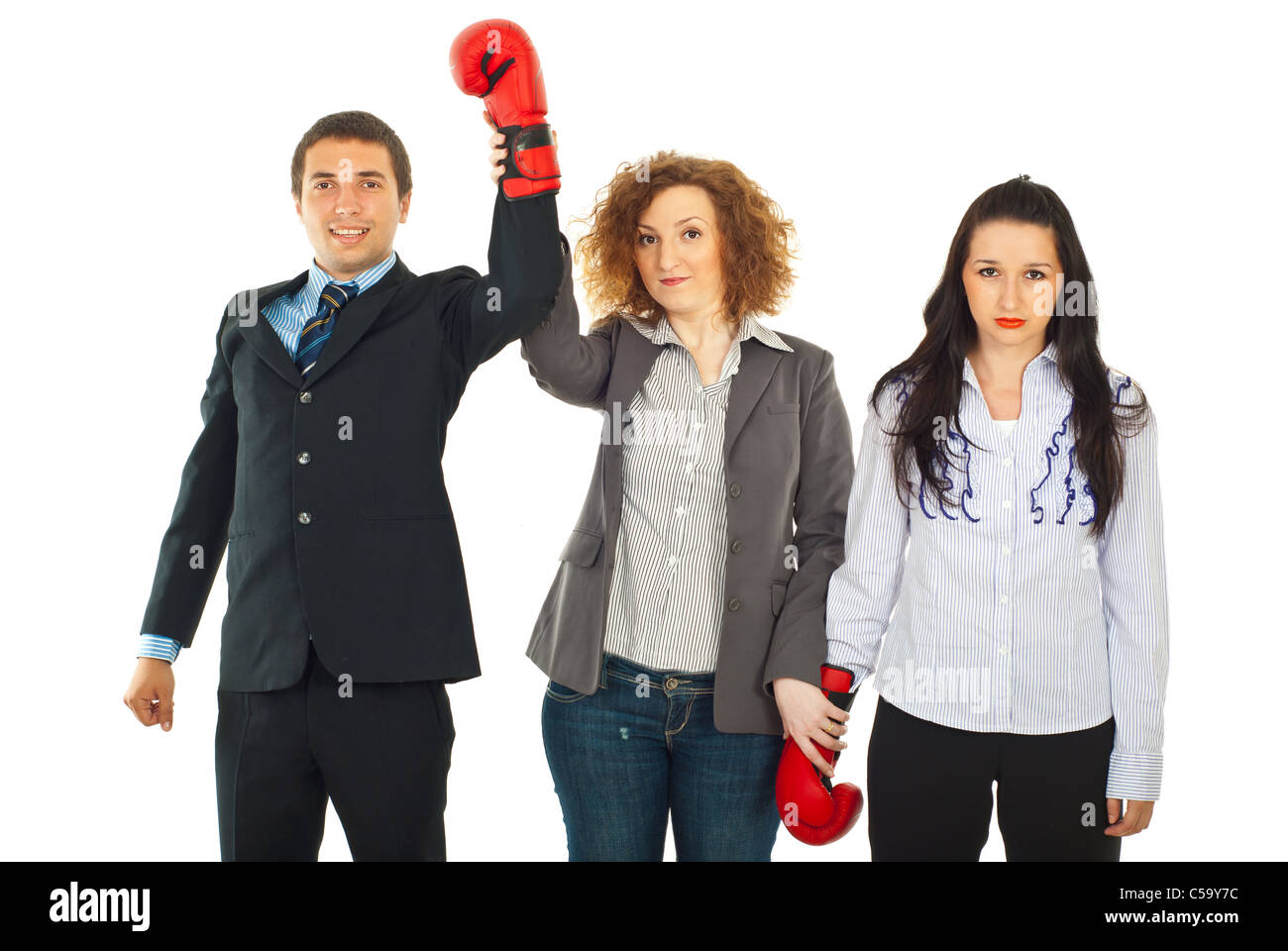Business woman raising the hand of winner competition and the other ...