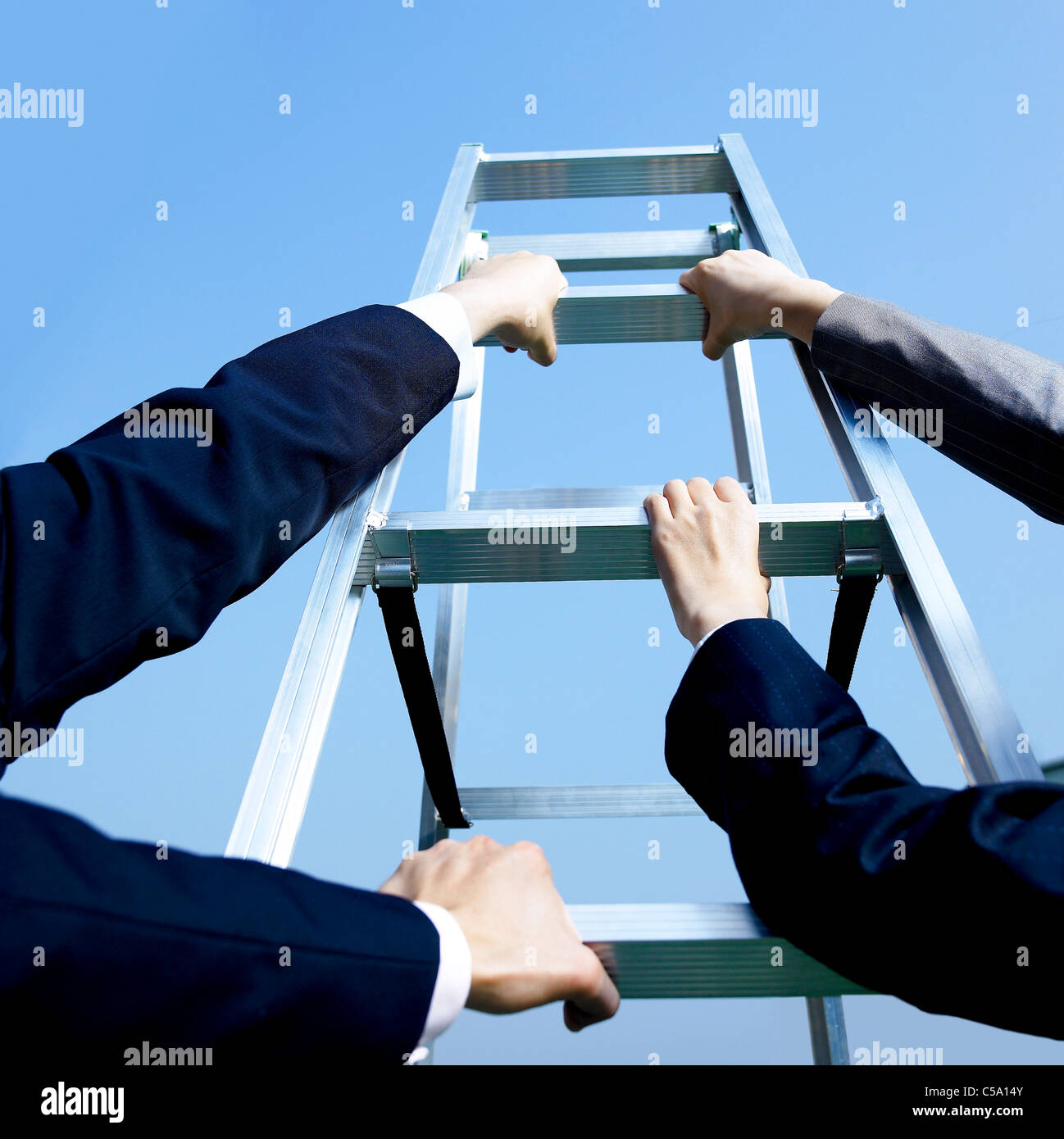 Businesspeople holding ladder Stock Photo - Alamy Businesspeople holding ladder Stock Photo - Alamy