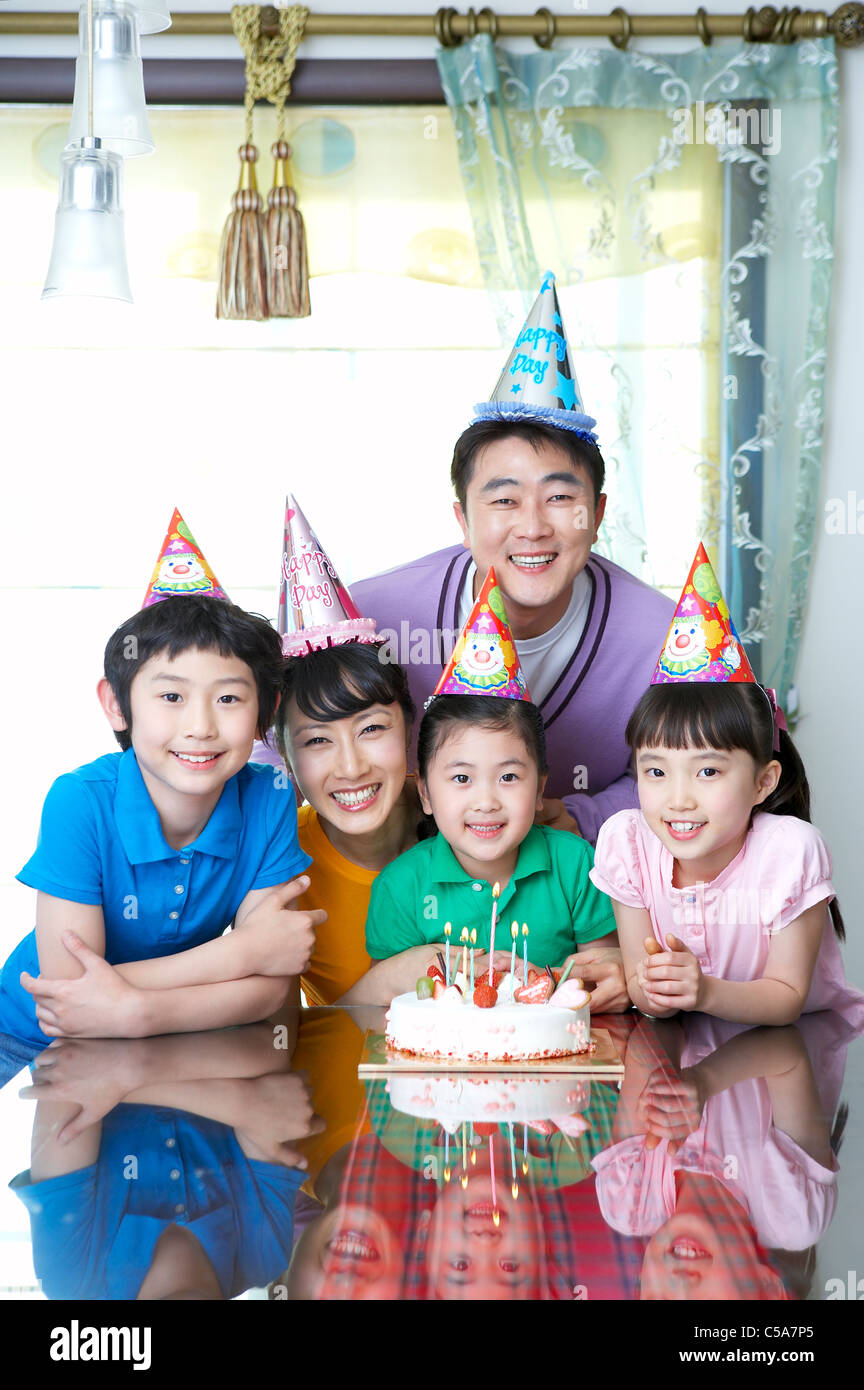 Portrait of family at birthday party Stock Photo - Alamy