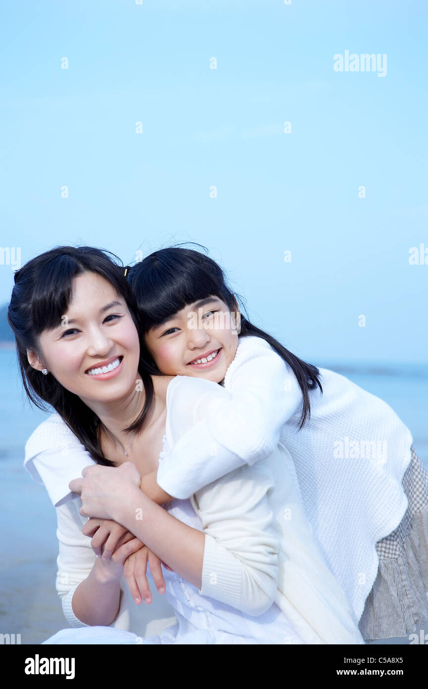 Woman mother motherhood piggyback hi-res stock photography and images ...