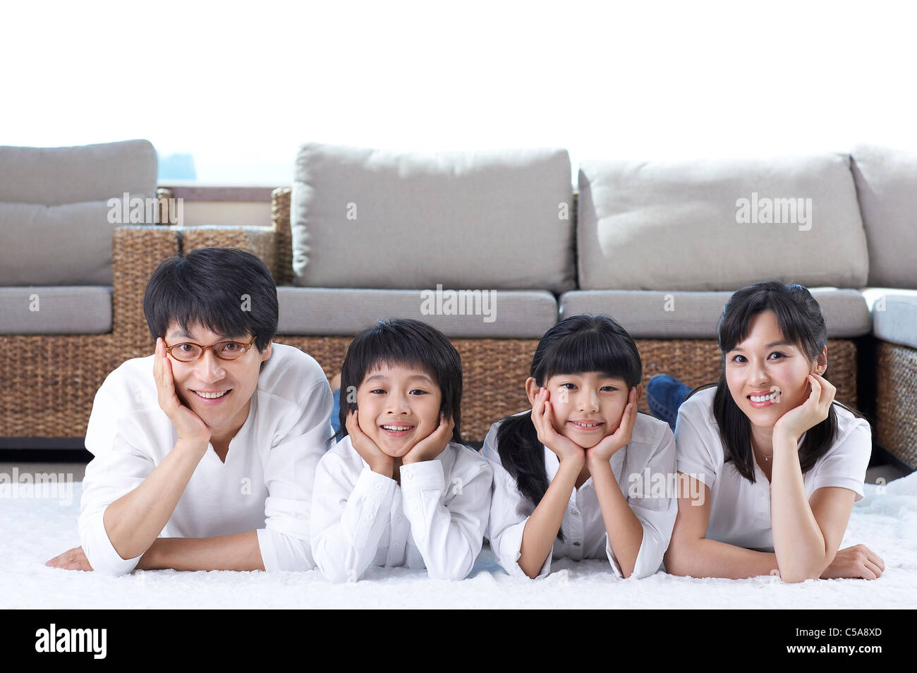 Portrait of family smiling Stock Photo - Alamy