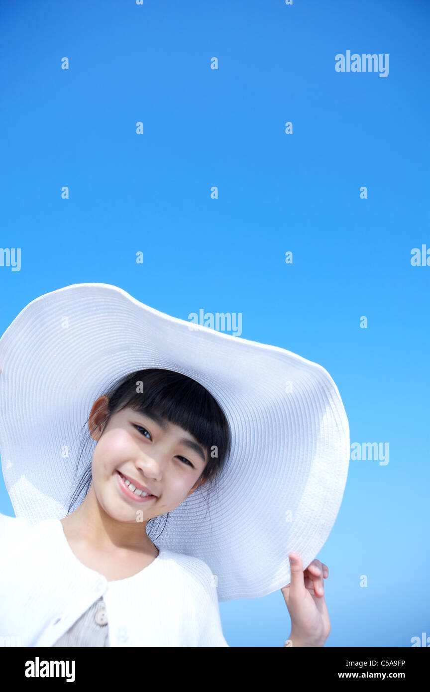 Side view of girl smiling Stock Photo - Alamy