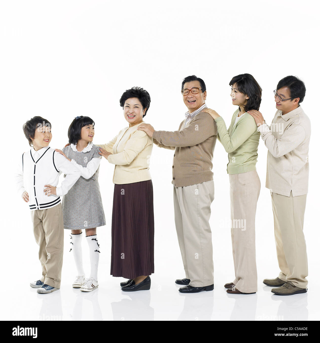 Mother father looking son Cut Out Stock Images & Pictures - Alamy