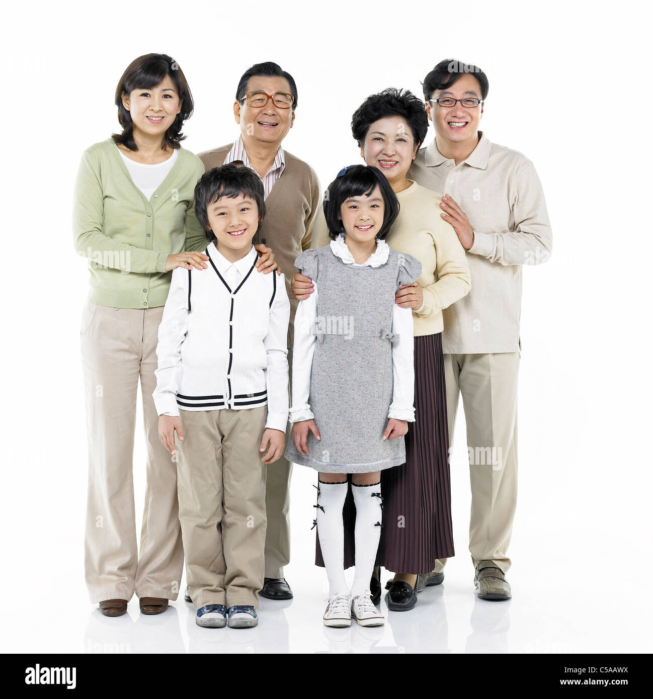 Portrait of family smiling Stock Photo - Alamy