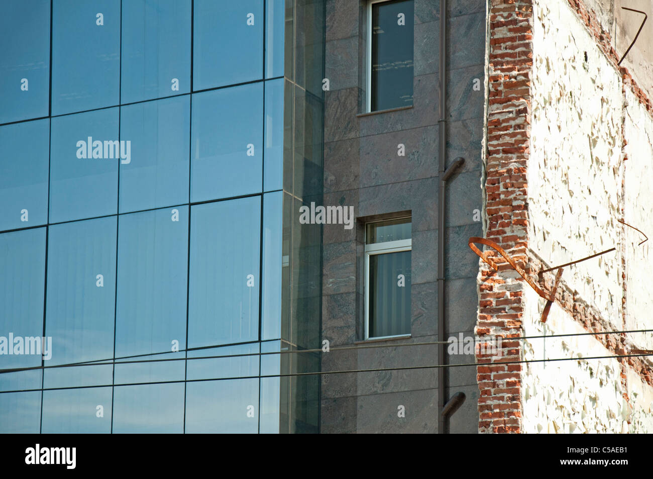 New and old destroyed office buildings Stock Photo - Alamy