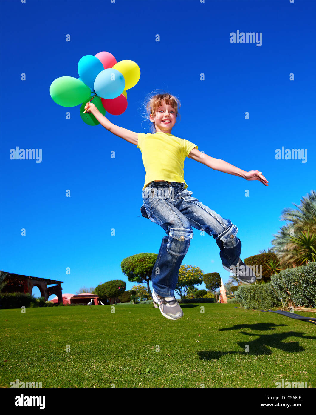 Child playing with balloons outdoor Stock Photo - Alamy