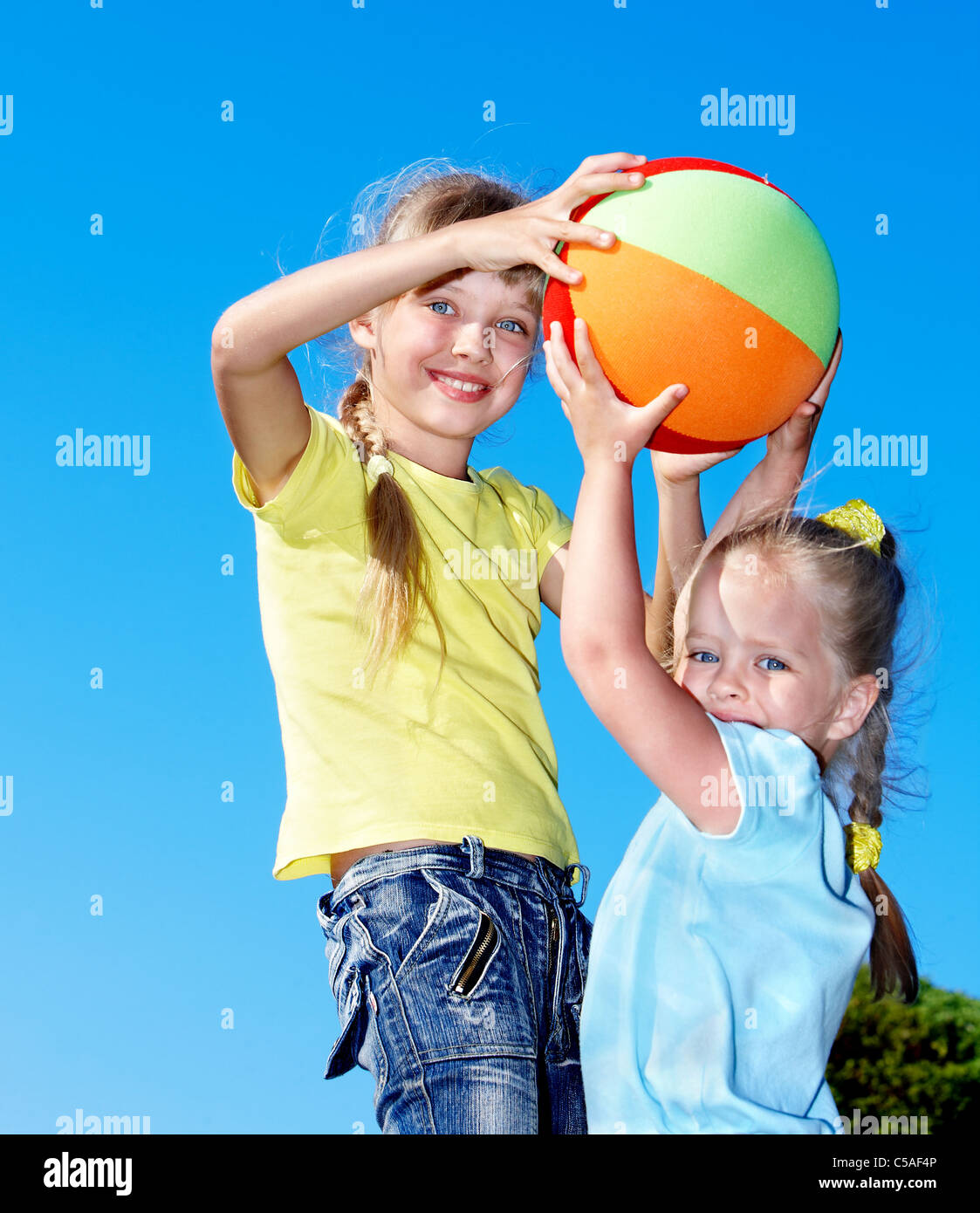 Children playing with ball outdoor Stock Photo - Alamy